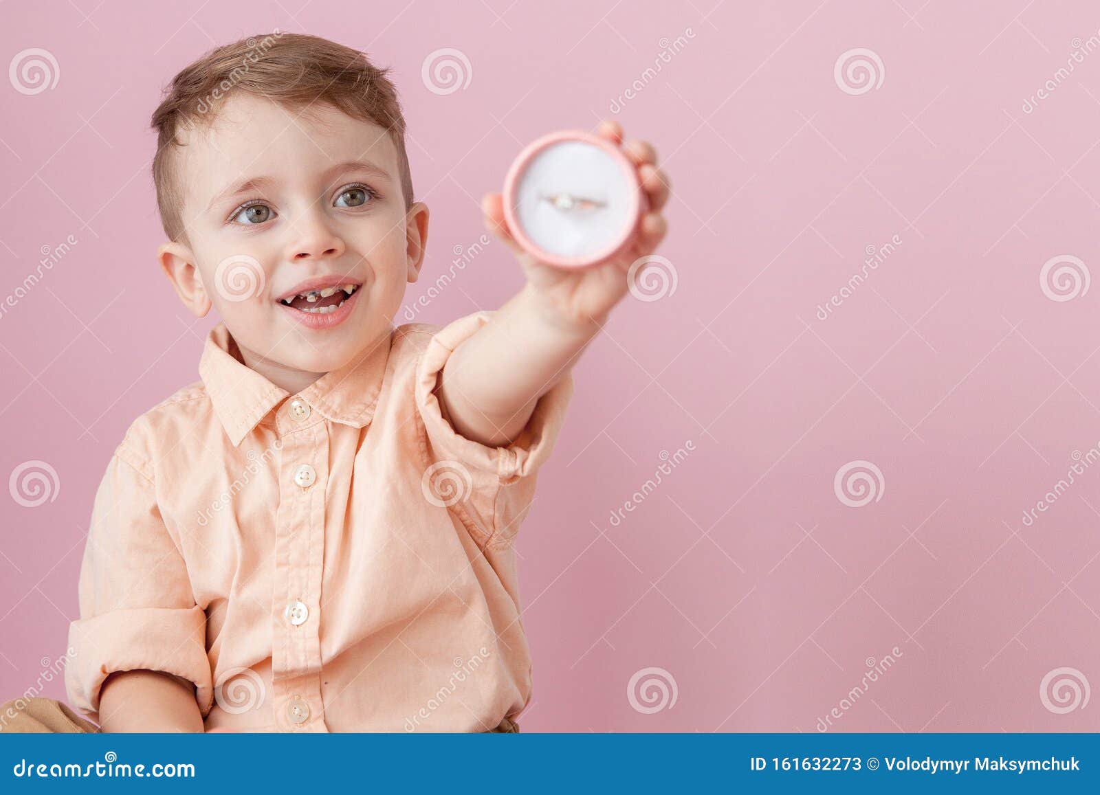 Boy Giving Ring in Box on Pink Background Stock Image - Image of ...