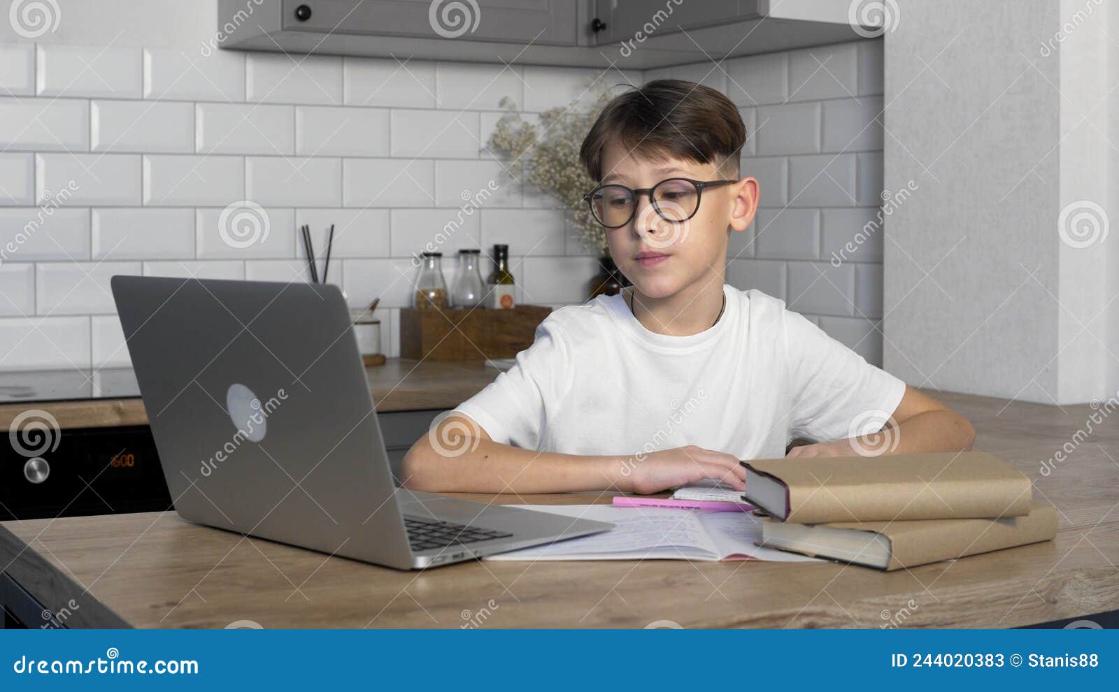 A Boy with Glasses is Doing His Homework. Study Stock Image - Image of ...