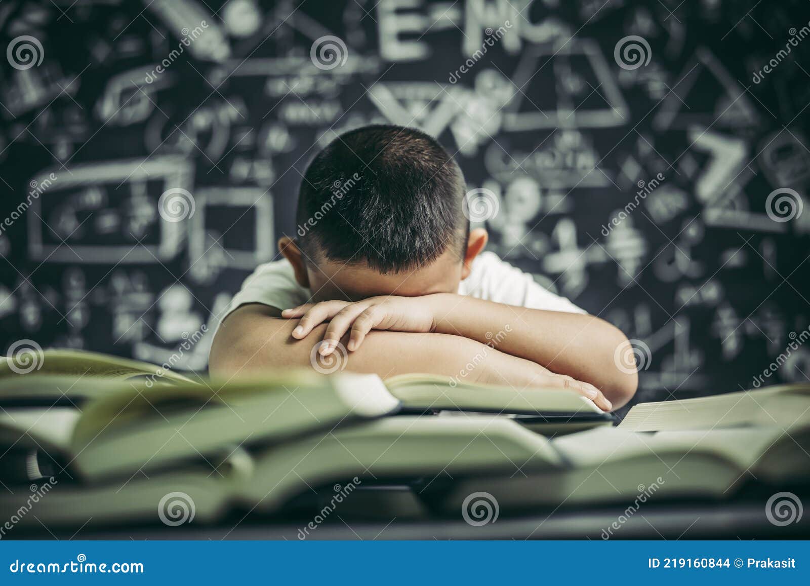 A Boy with Glasses Studying and Drowsy Stock Photo - Image of ...