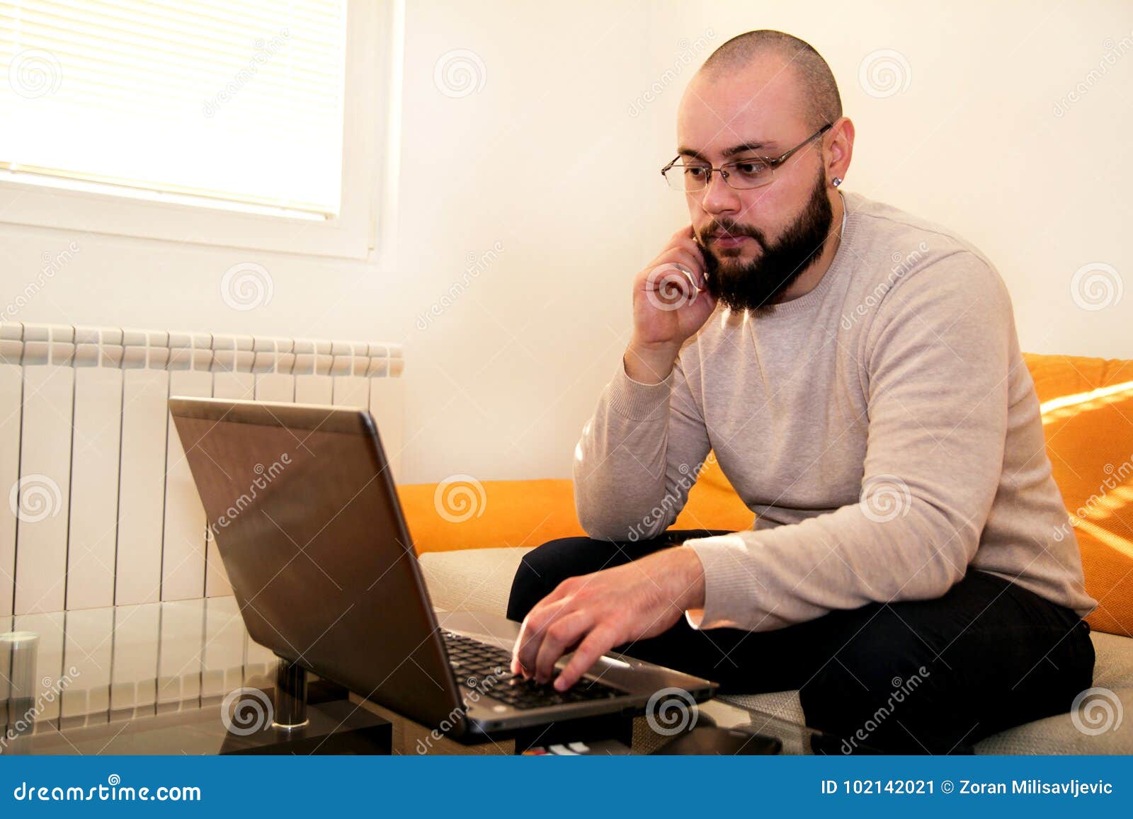 Guy with Glasses Working on a Laptop at Home Stock Image - Image of ...