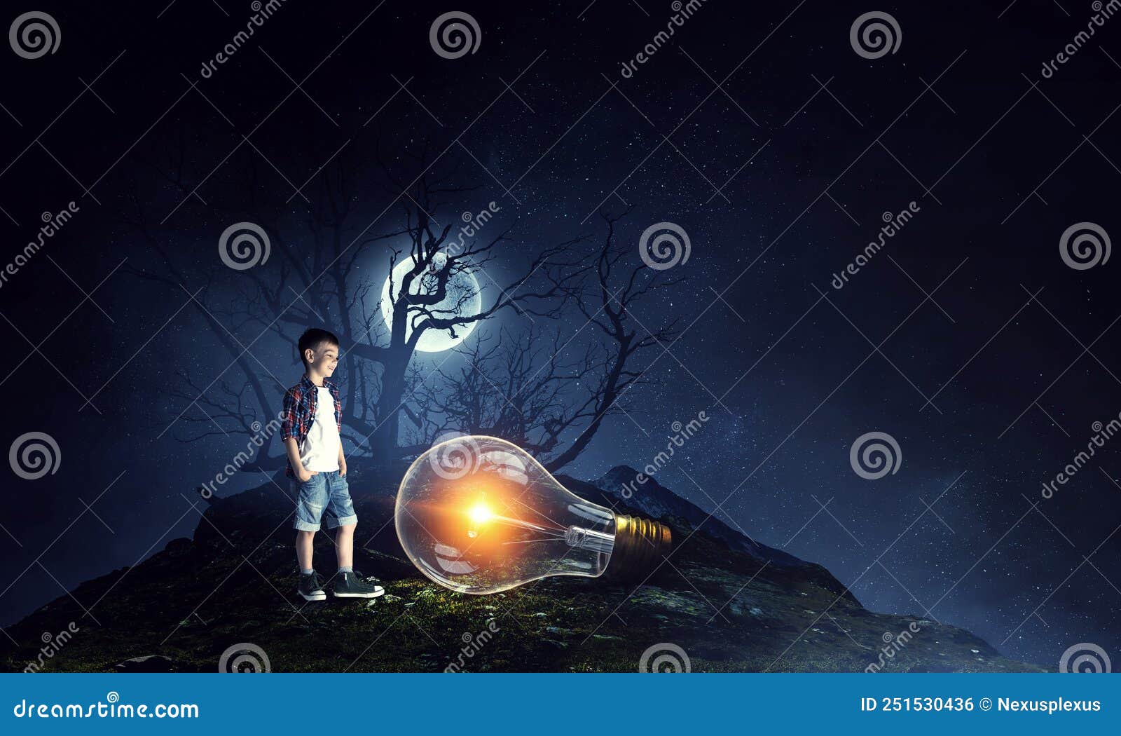 Boy with a Glowing Light Bulb Stock Photo - Image of power, little ...