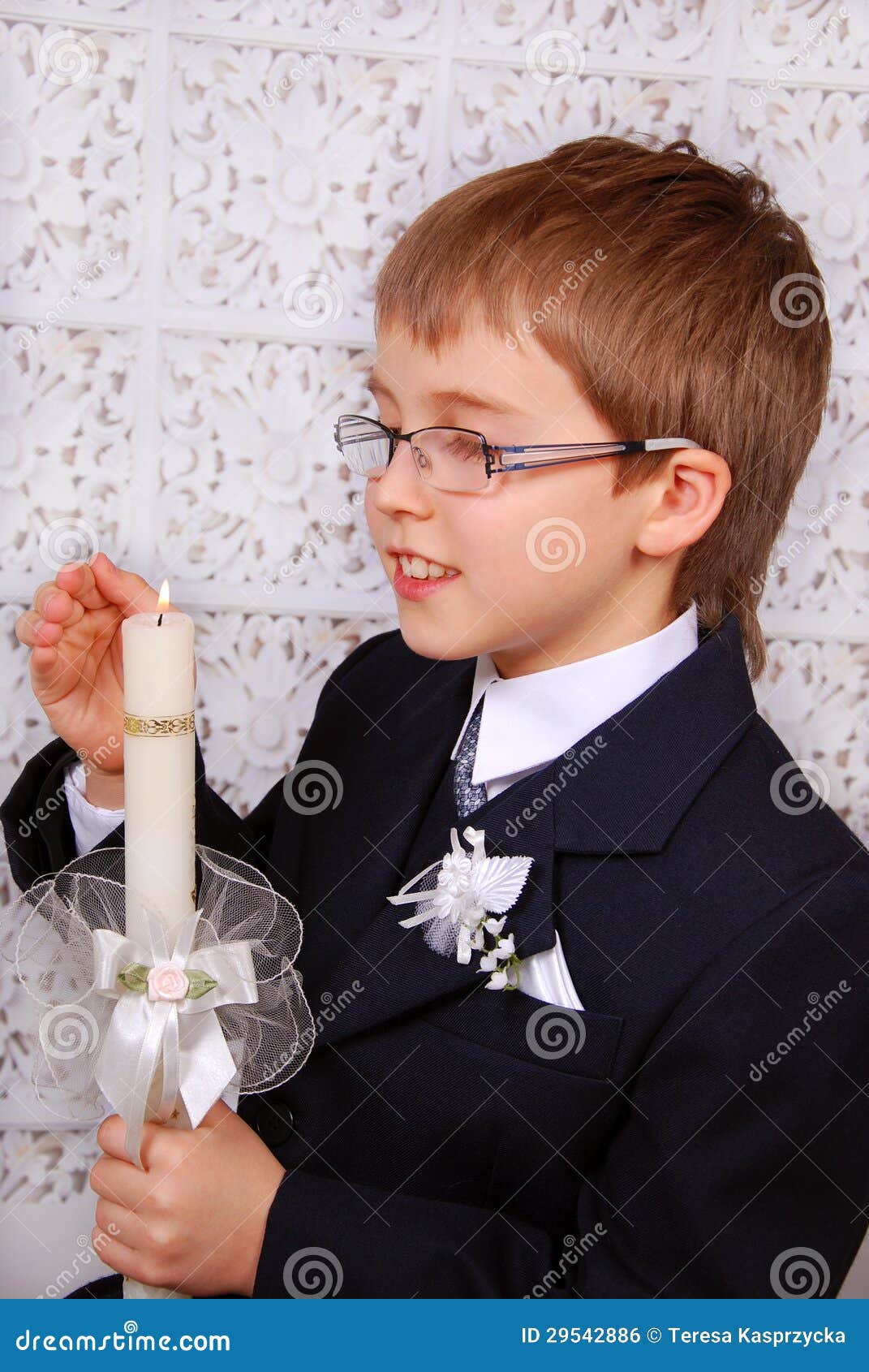Boy Going To the First Holy Communion with Candle Stock Photo - Image ...