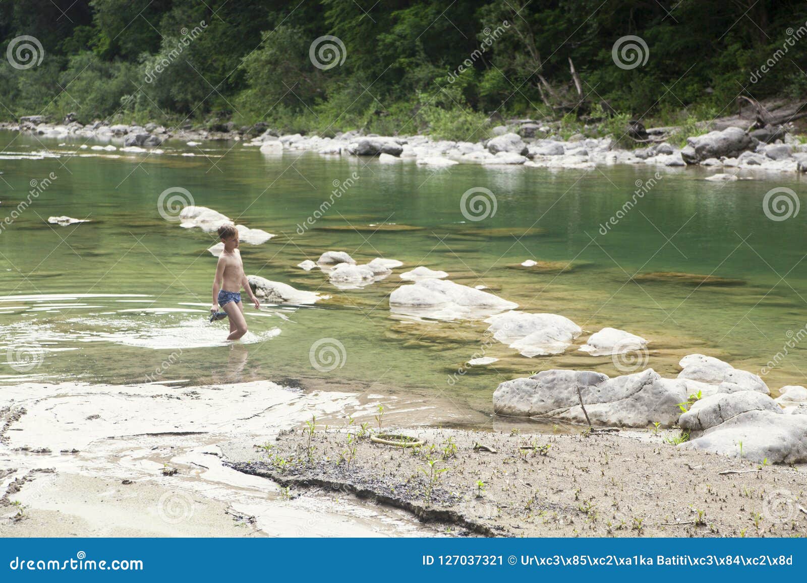 Boy at the river stock image. Image of leisure, happy - 127037321