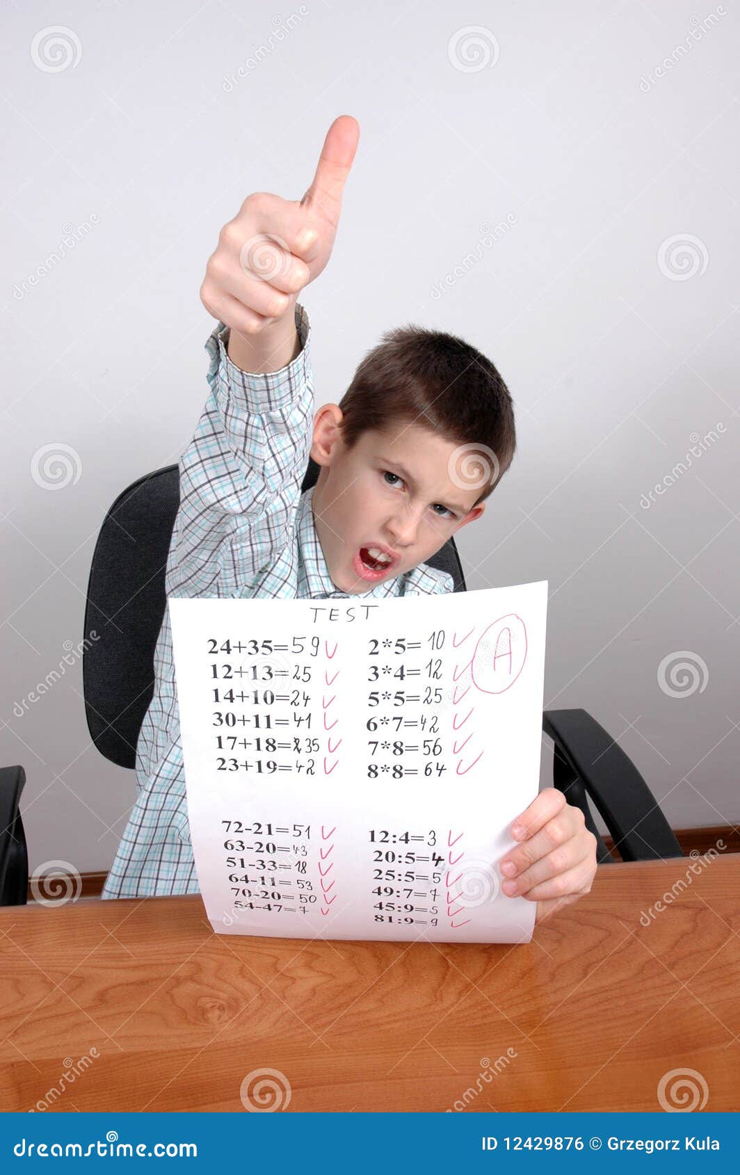 Boy with a grade stock photo. Image of addition, mathematics - 12429876