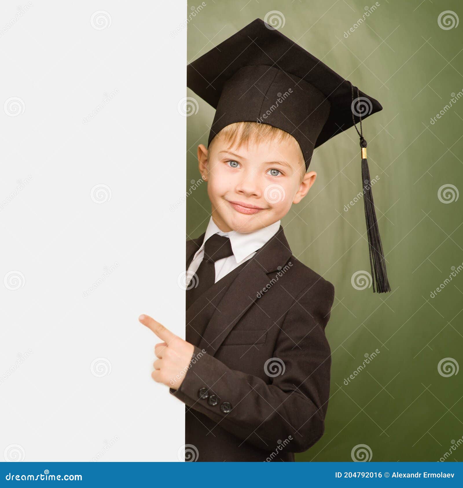 Boy in Graduation Hat Pointing at Blank Placard Stock Photo - Image of ...