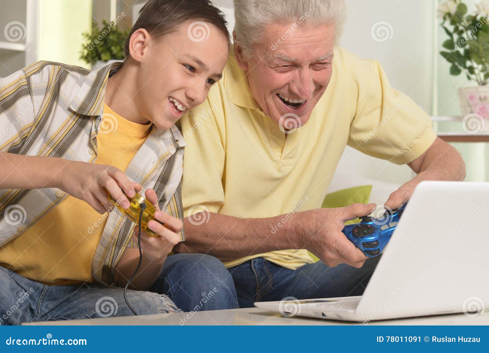 Boy and Grandfather Playing Computer Game Stock Image - Image of ...