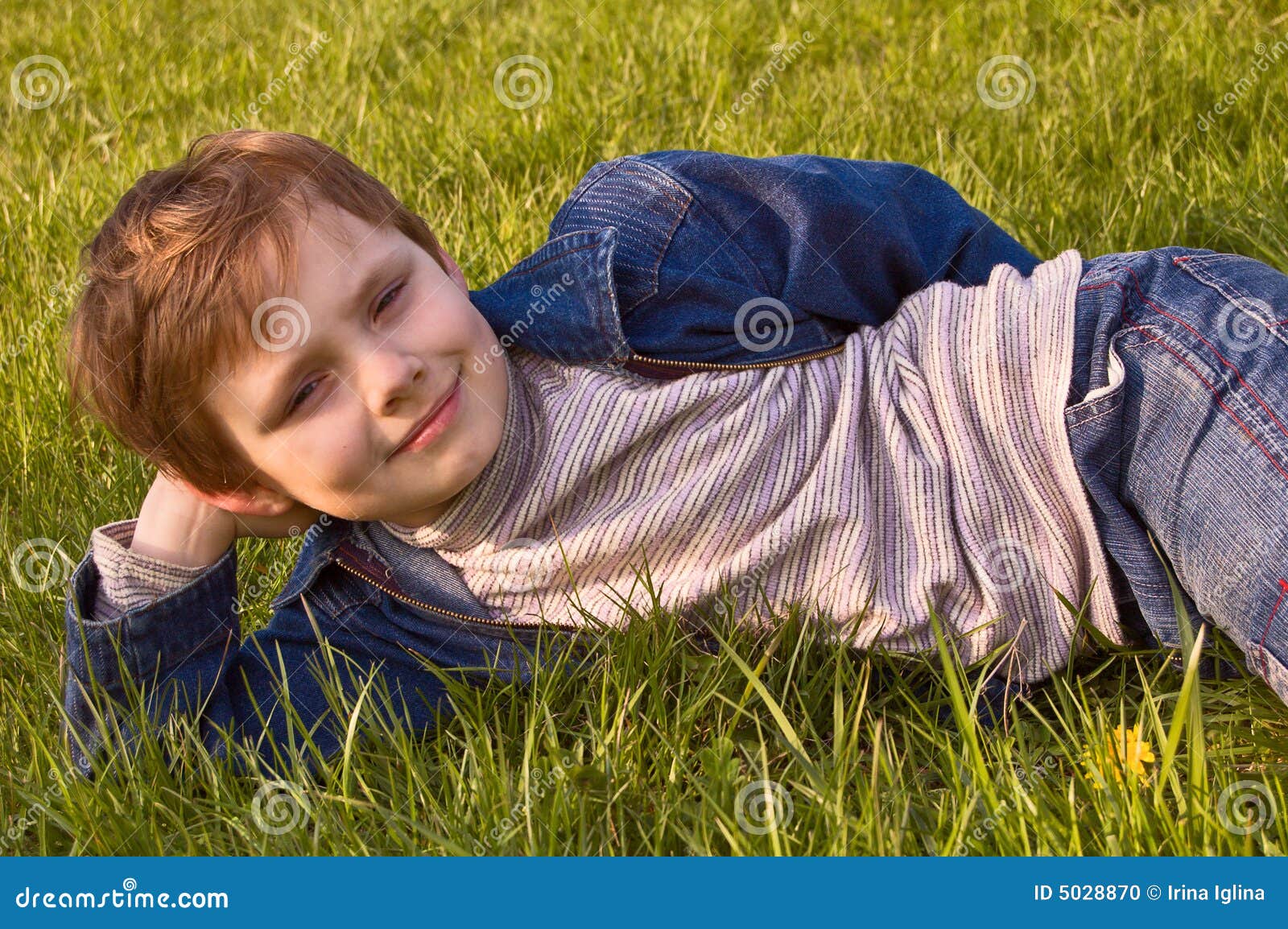 Boy on the grass stock photo. Image of outdoor, adolescence - 5028870