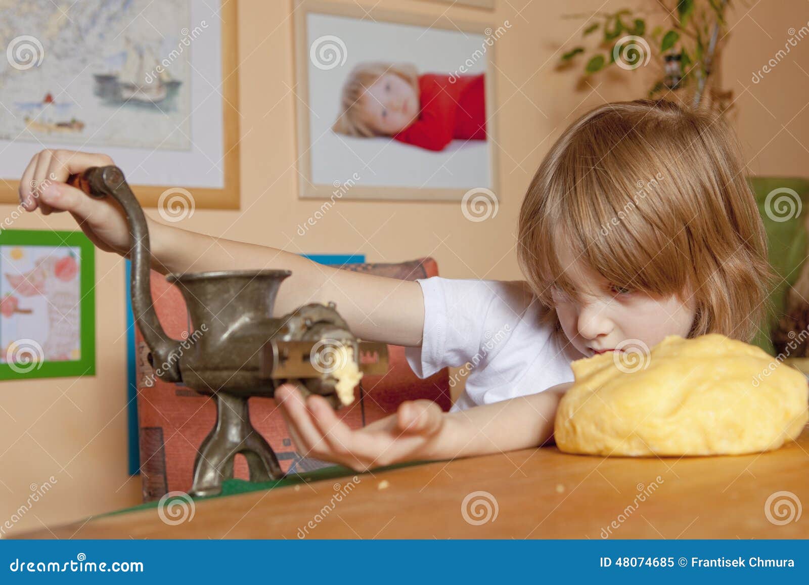Boy Grinding Dough stock image. Image of flour, work - 48074685