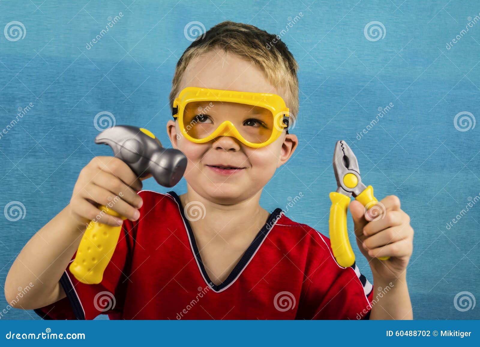 Boy and the Hammer and Tongs Stock Photo - Image of tool, child: 60488702