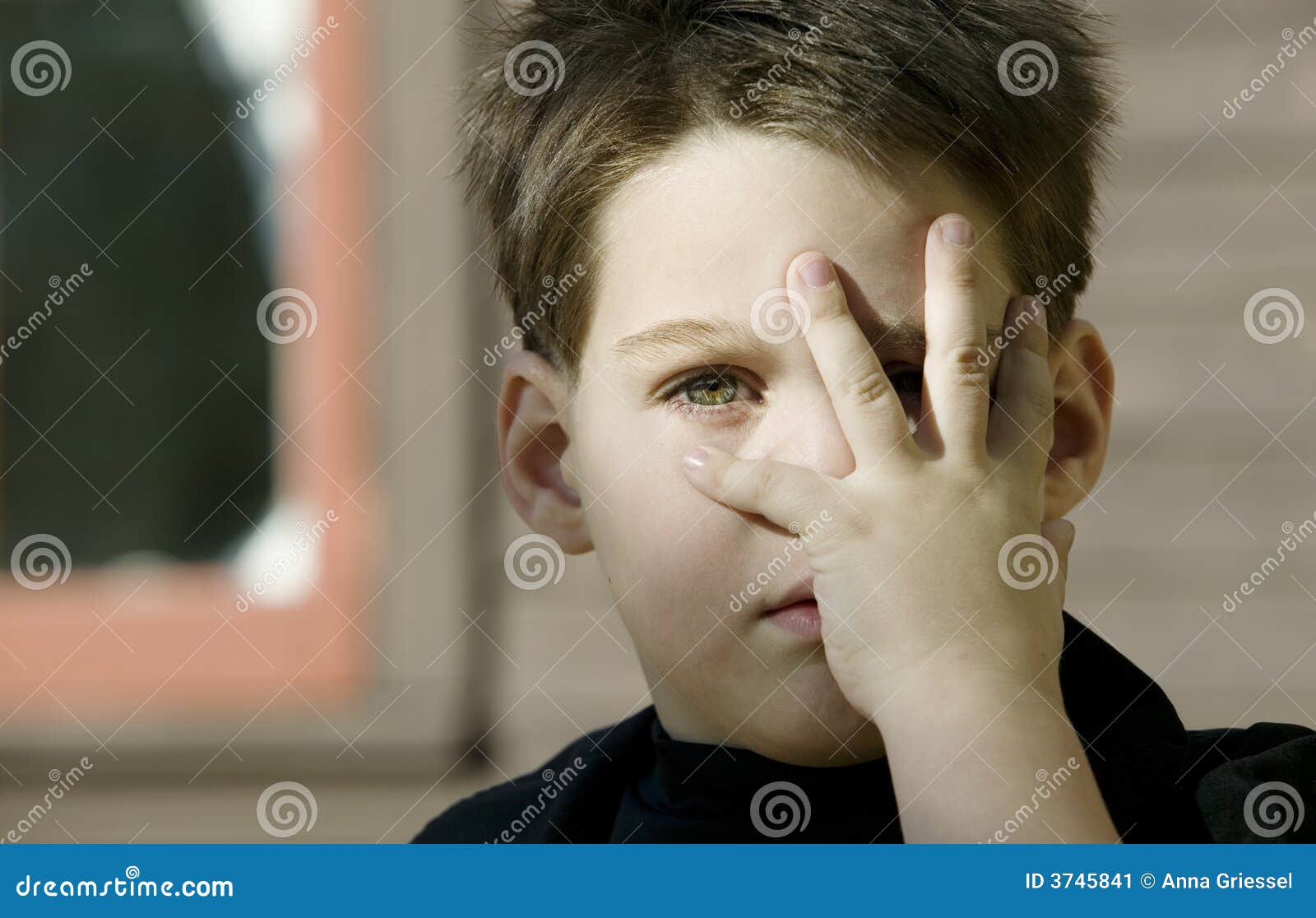 Boy with a Hand in Front of His Face Stock Image - Image of hand ...