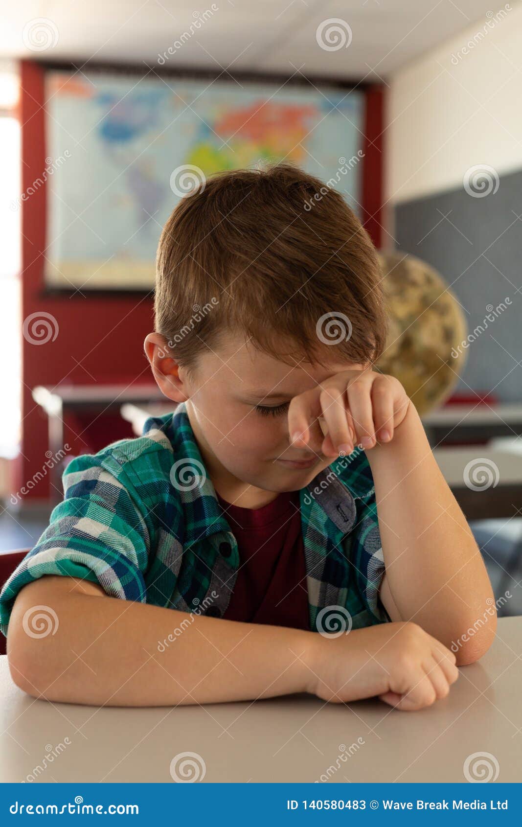 Boy with Hand on Head Sleeping in a Classroom Stock Image - Image of ...