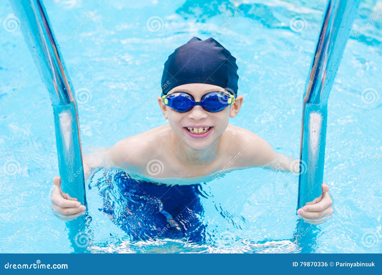 Boy happy at swimming pool stock photo. Image of cheerful - 79870336