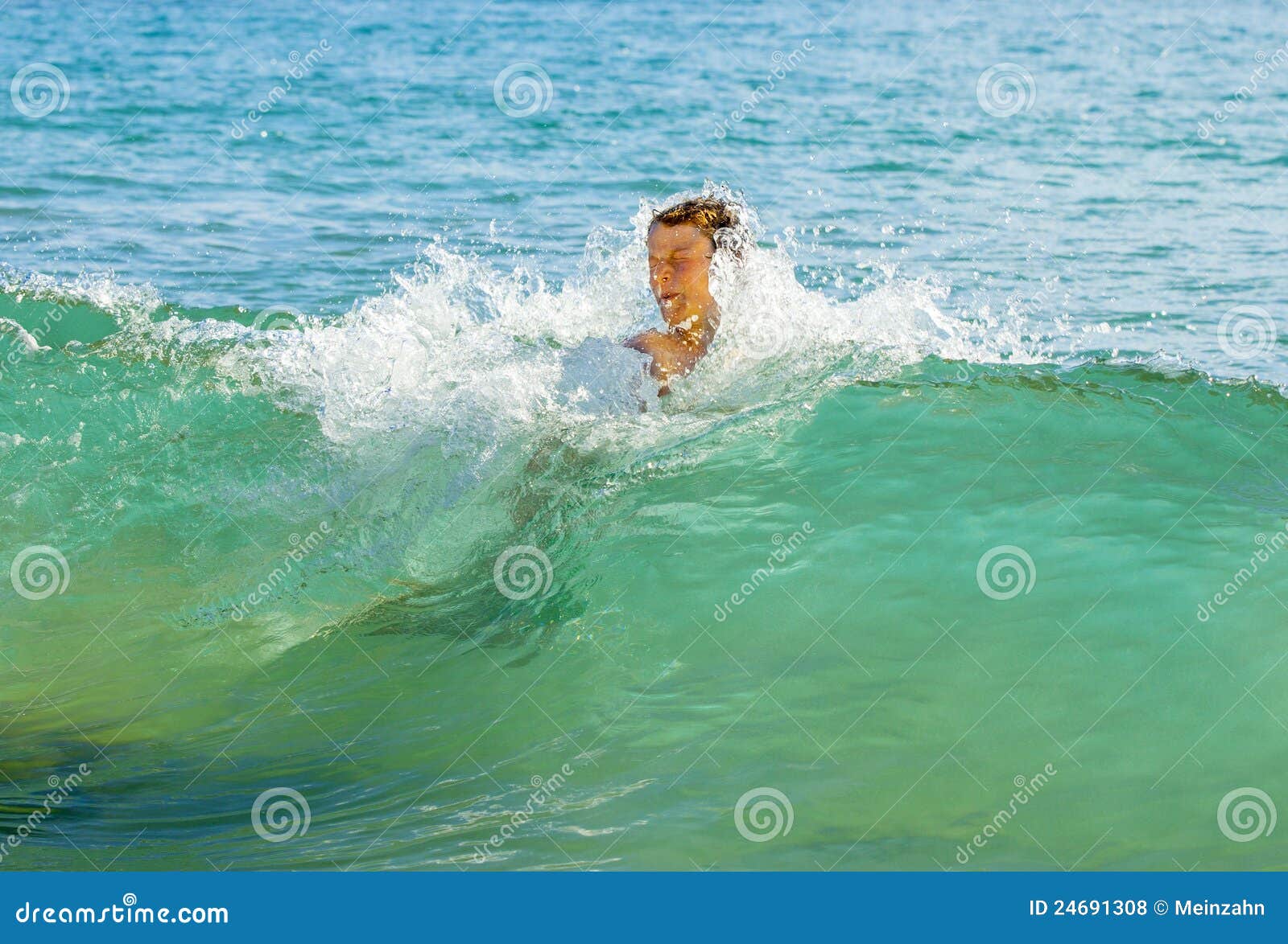 Boy Has Fun Jumping in the Waves Stock Photo - Image of recreation ...