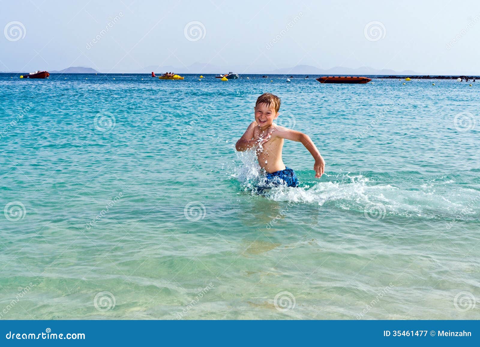 Boy Has Fun Running in the Water Stock Image - Image of ocean ...