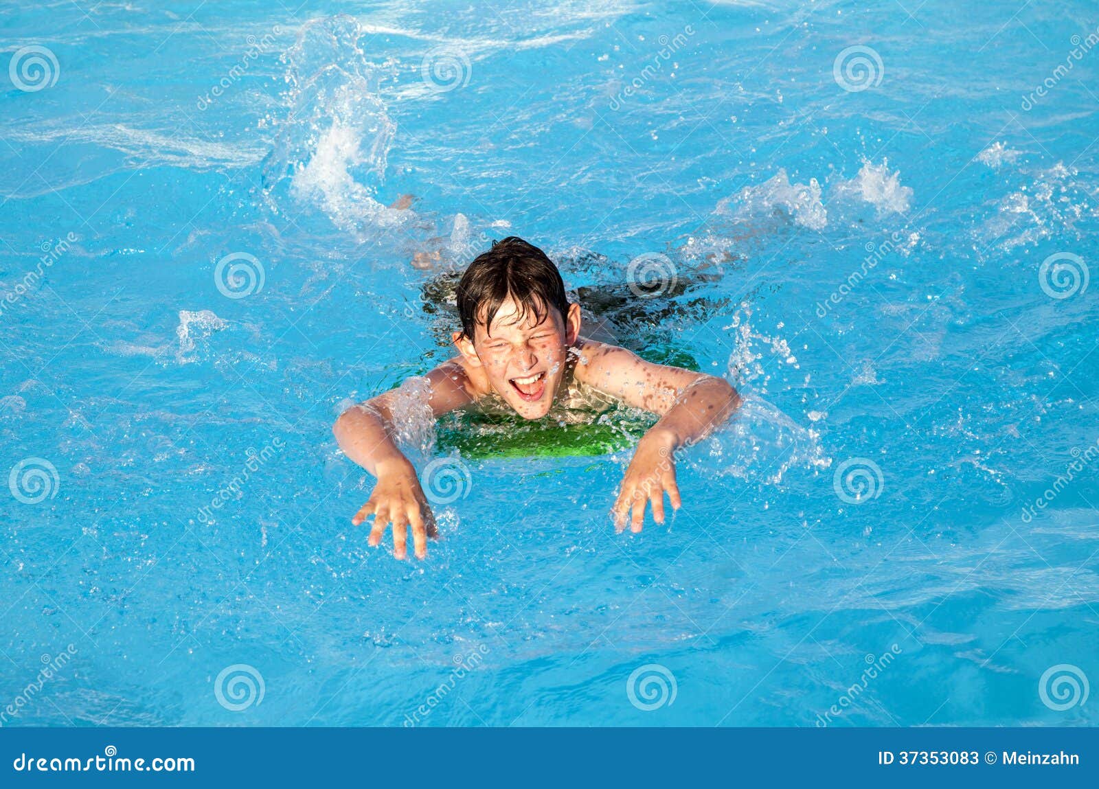 Boy Has Fun on the Surfboard in the Pool Stock Image - Image of close ...