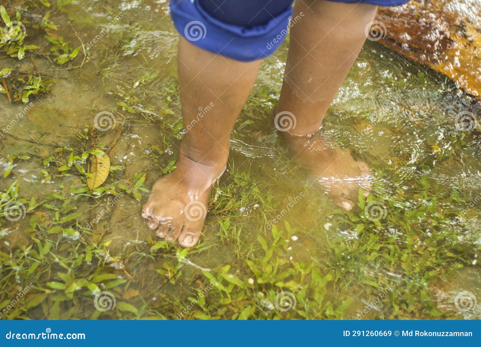 A Boy Has Water Up To His Ankles Stock Image - Image of lifestyle ...