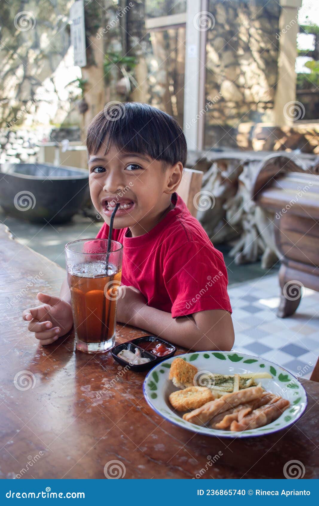 A Boy is Having Breakfast Snacks Stock Photo - Image of kitchen, human ...