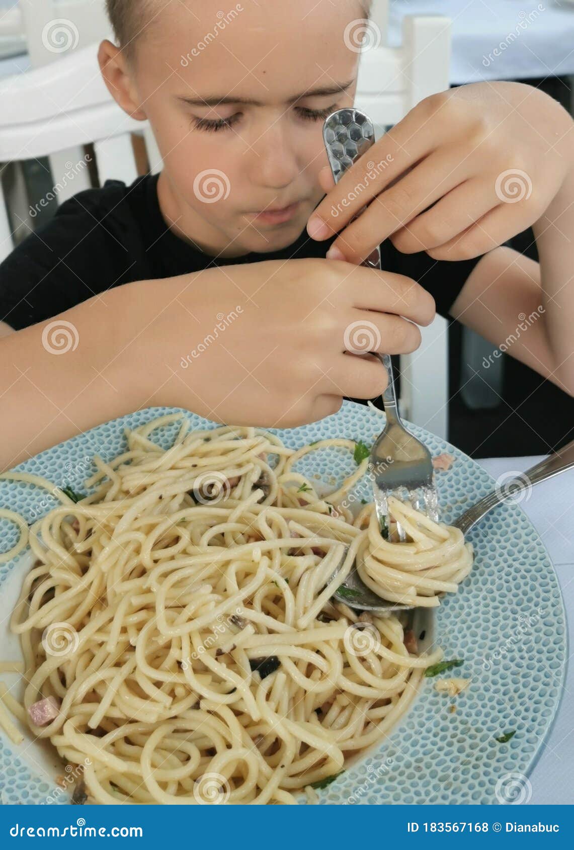 Boy having dinner stock photo. Image of lunch, cooking - 183567168