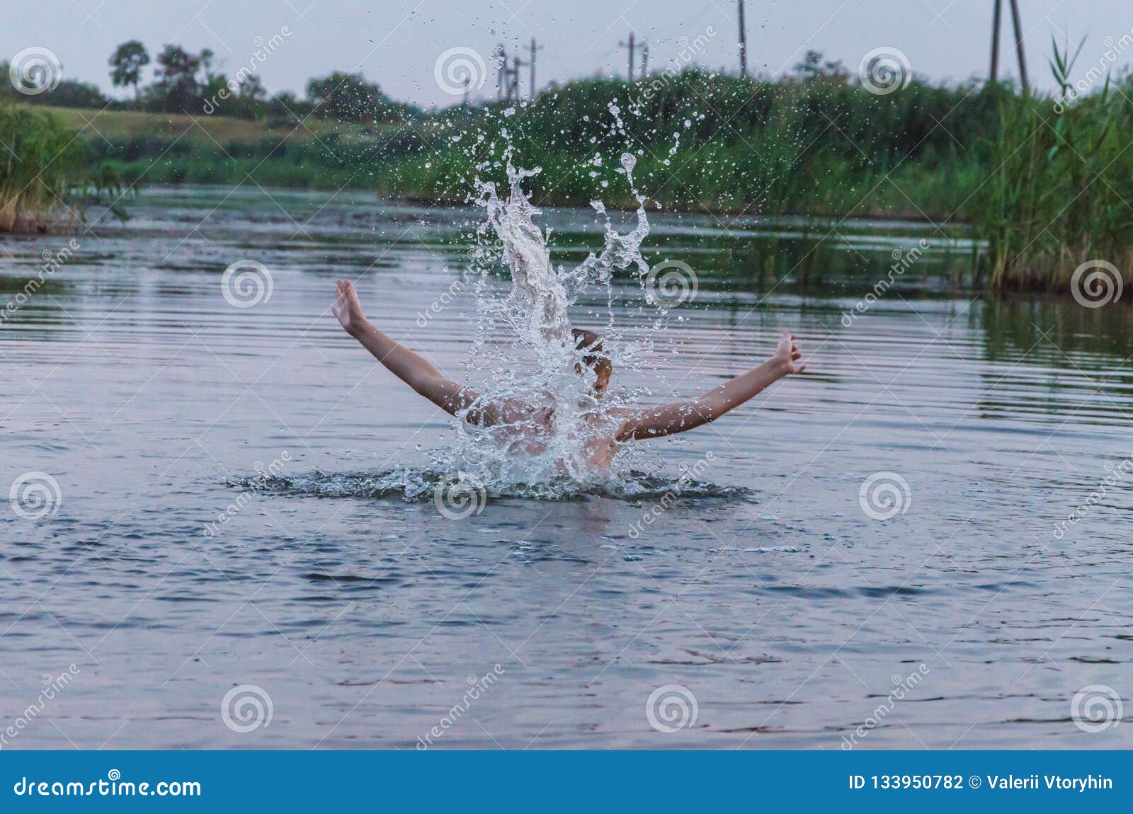 The Boy is Having Fun in the River Stock Photo - Image of active ...