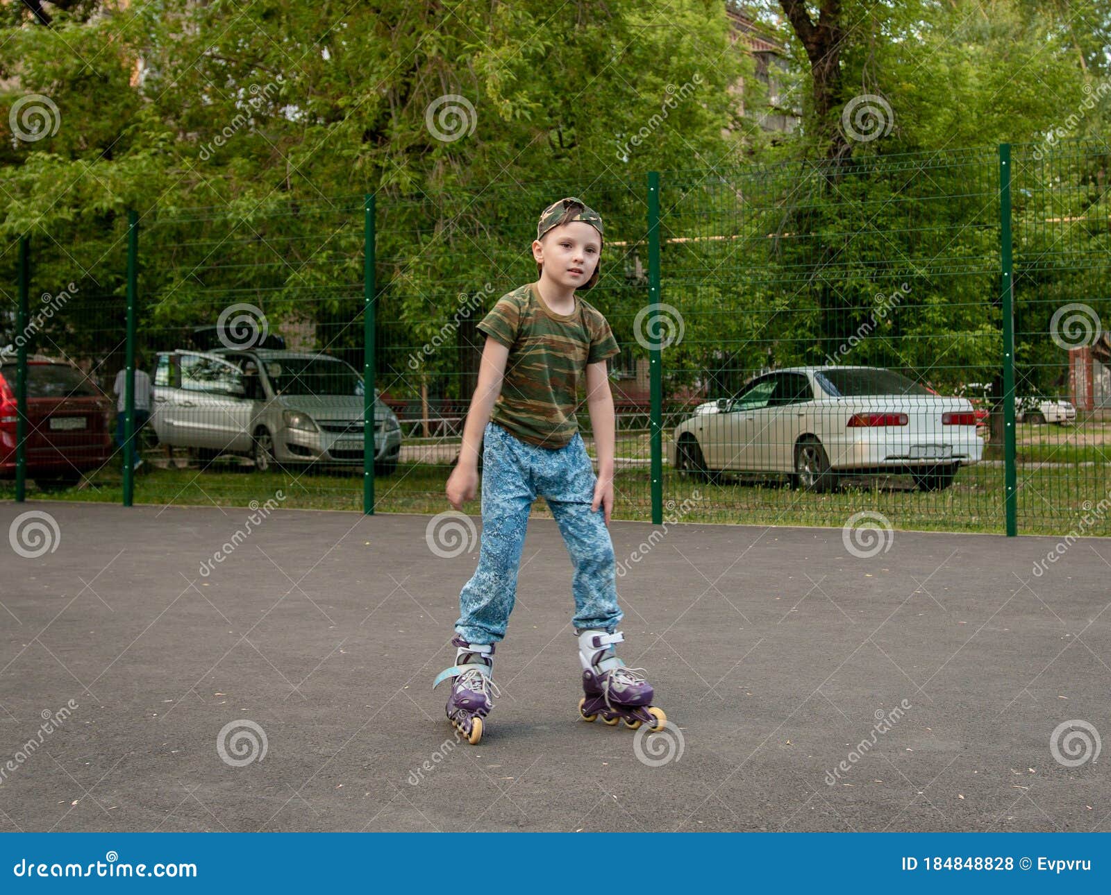 Boy Having Fun Rollerblading on the Playground Stock Photo - Image of ...