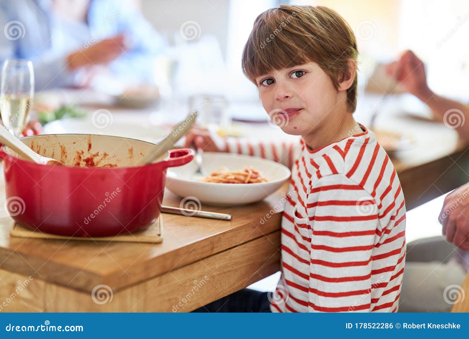 Boy Having Spaghetti with Family Stock Photo - Image of night, parents ...