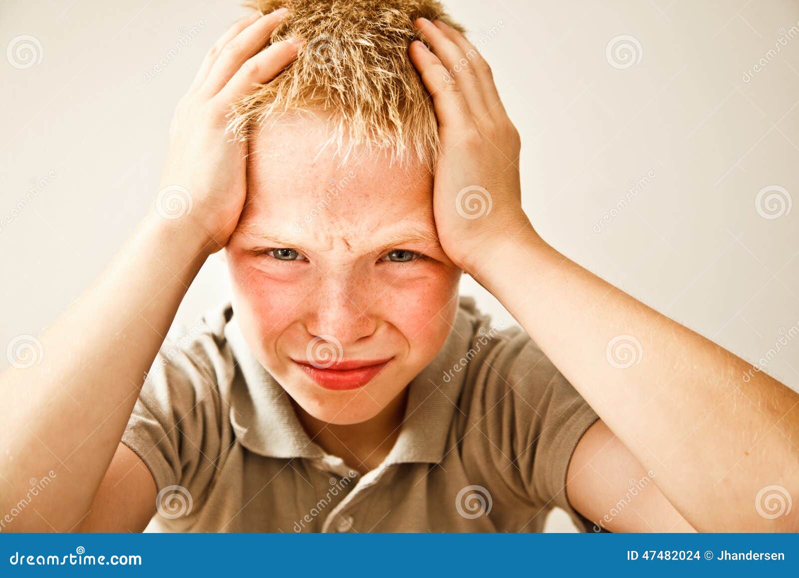 Boy with a headache stock photo. Image of facial, front - 47482024