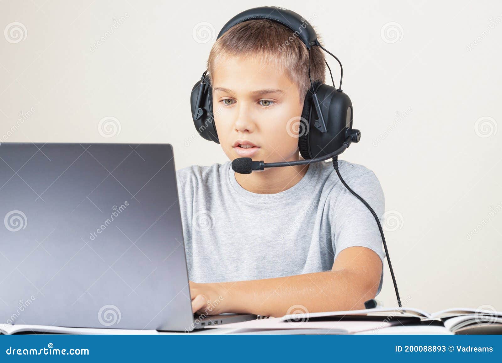 Boy in a Headphones with Notebook Computer. Online Learning, Remote ...
