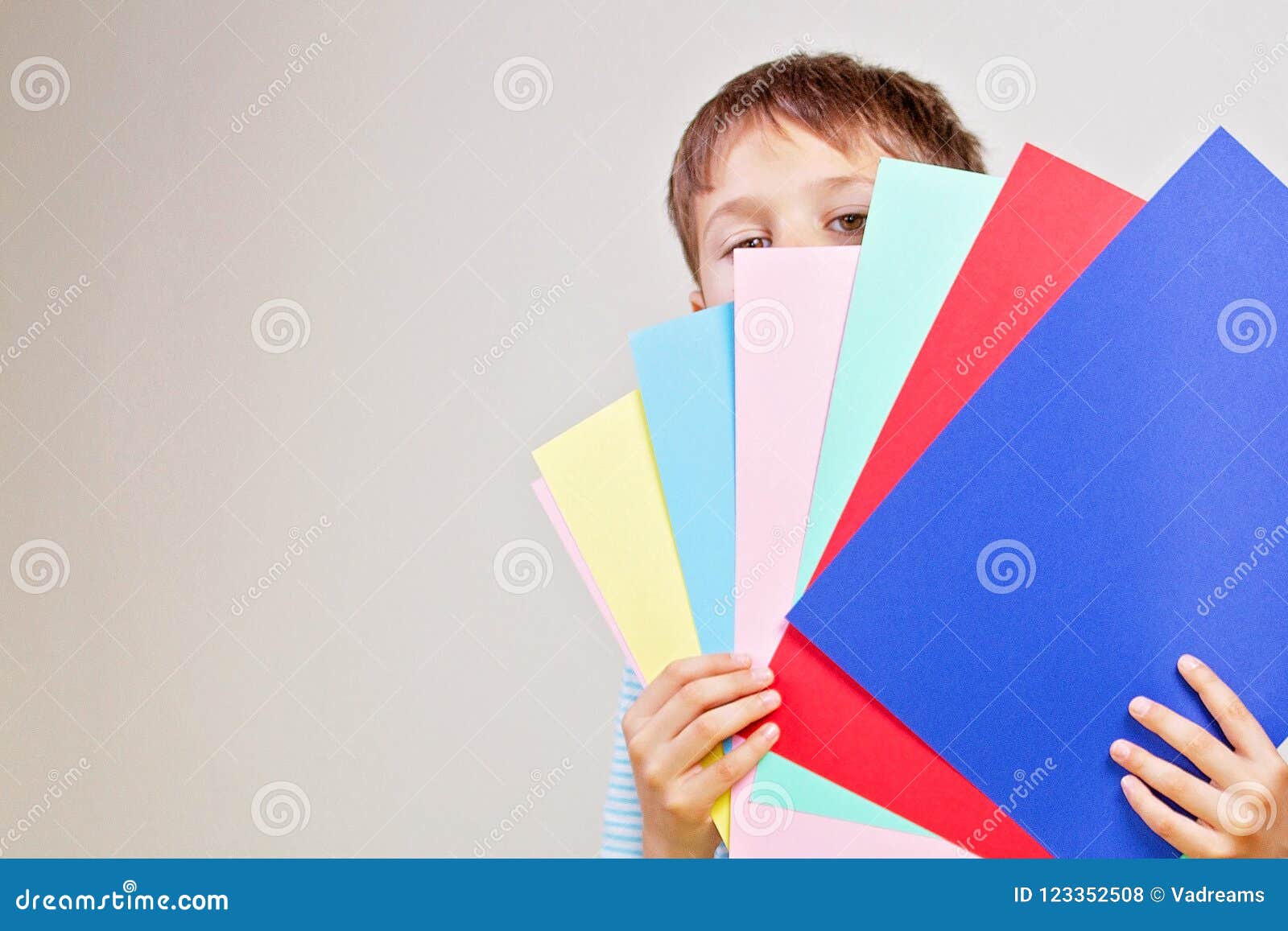 Boy Hide His Face with the Colored Paper Stock Photo - Image of ...