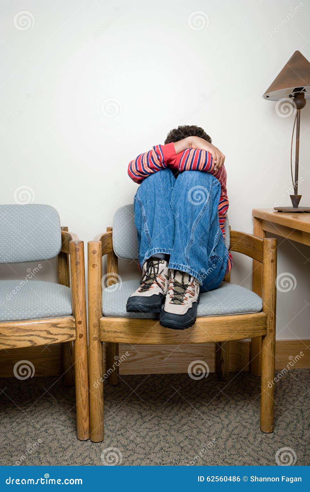Boy hiding stock photo. Image of michigan, nervous, anxious - 62560486