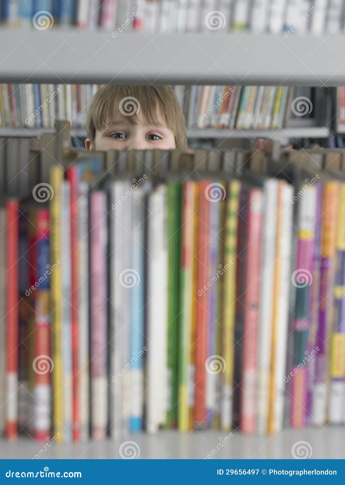 Boy Hiding Behind the Books Stock Image - Image of hide, ethnicity ...