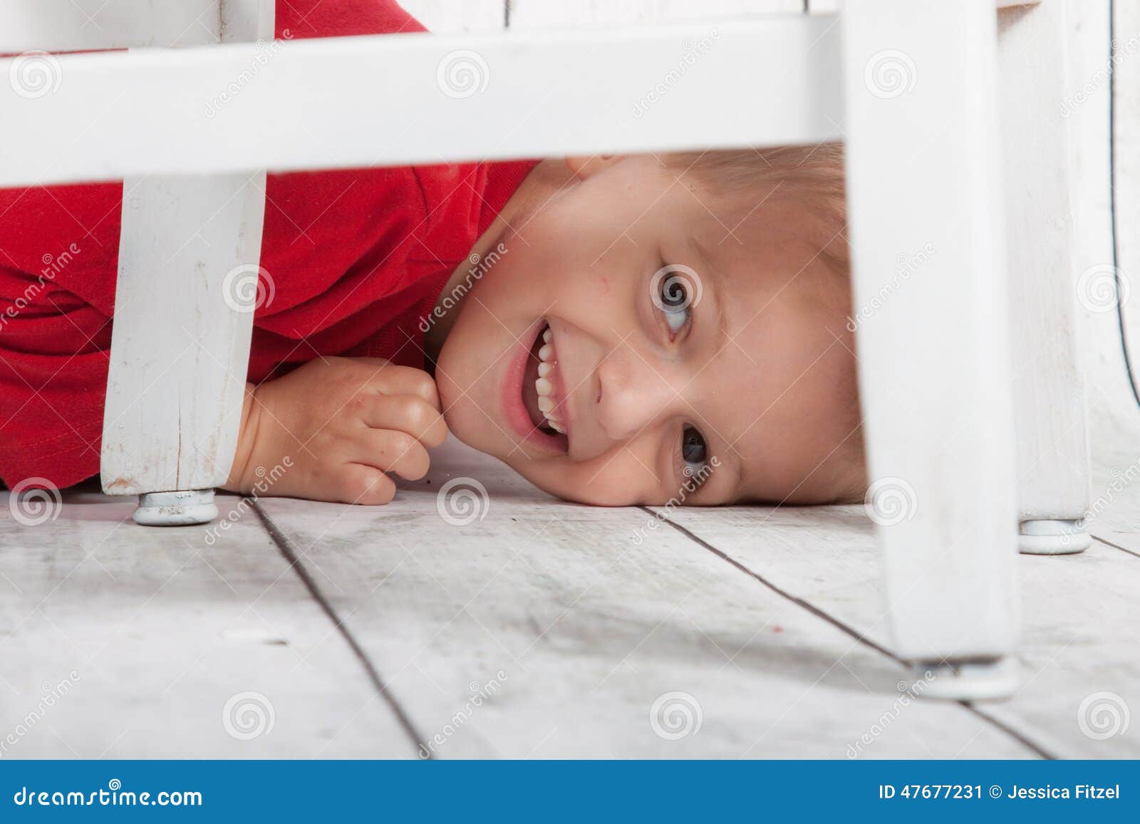 Boy hiding stock image. Image of hiding, studio, happy - 47677231