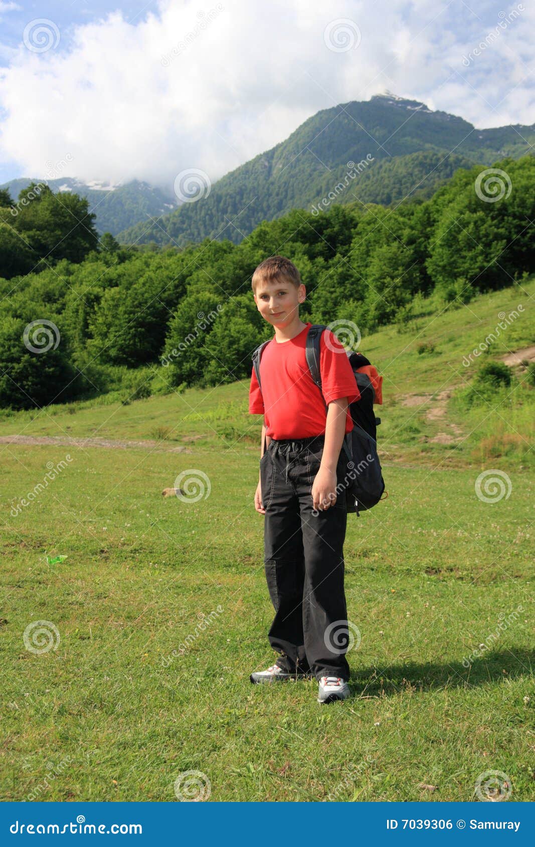 Boy hiking in countryside stock photo. Image of rural - 7039306