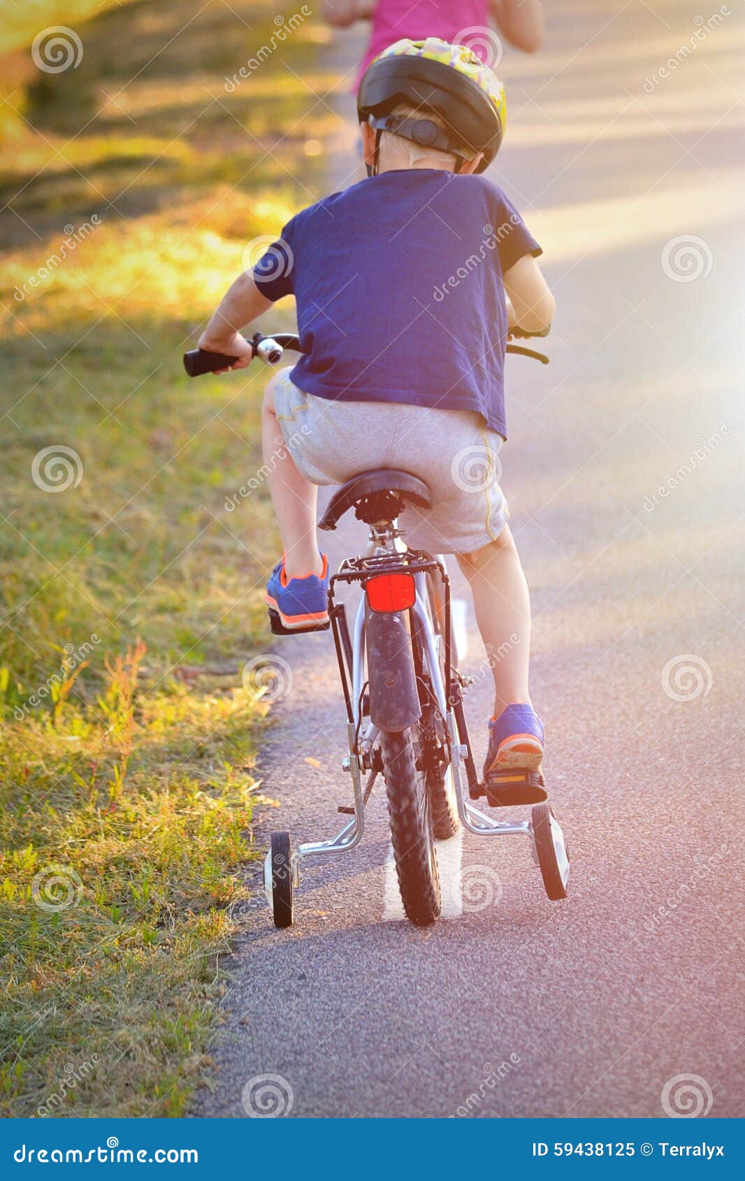 Boy on his bike stock image. Image of summer, peaceful - 59438125