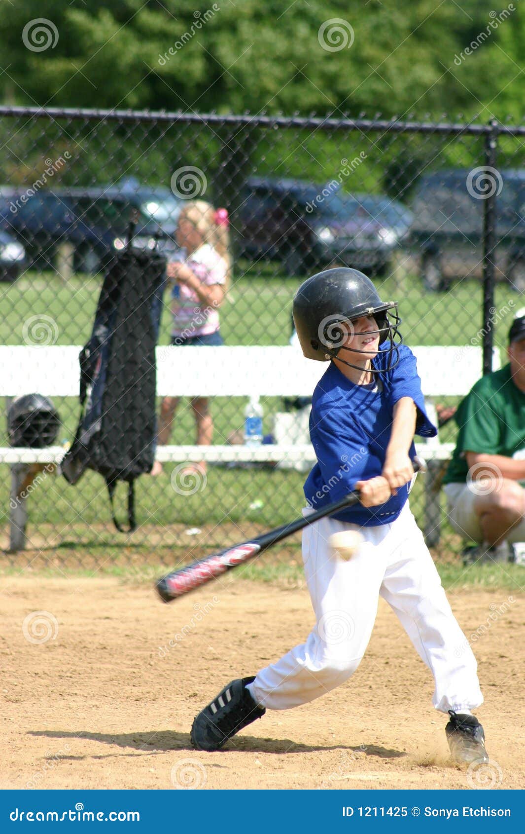 Boy Hitting Ball stock image. Image of blue, child, field - 1211425