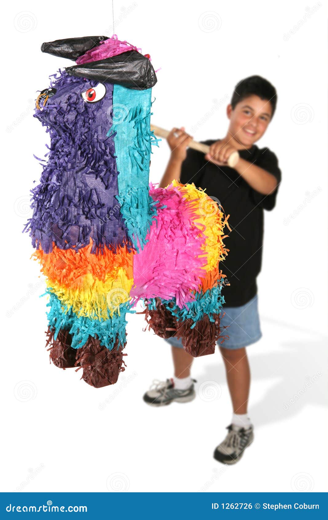 Boy Hitting Pinata stock photo. Image of candy, fiesta - 1262726
