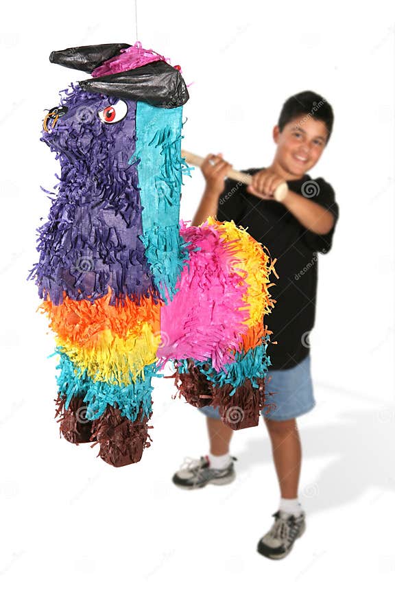 Boy Hitting Pinata stock photo. Image of candy, fiesta - 1262726