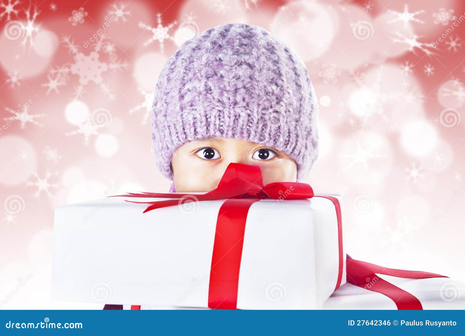 Boy Hold Gifts on Red Defocused Lights Background Stock Photo - Image ...