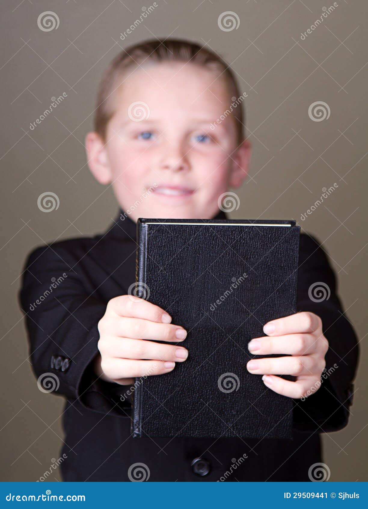 Boy holding book out stock image. Image of bible, little - 29509441