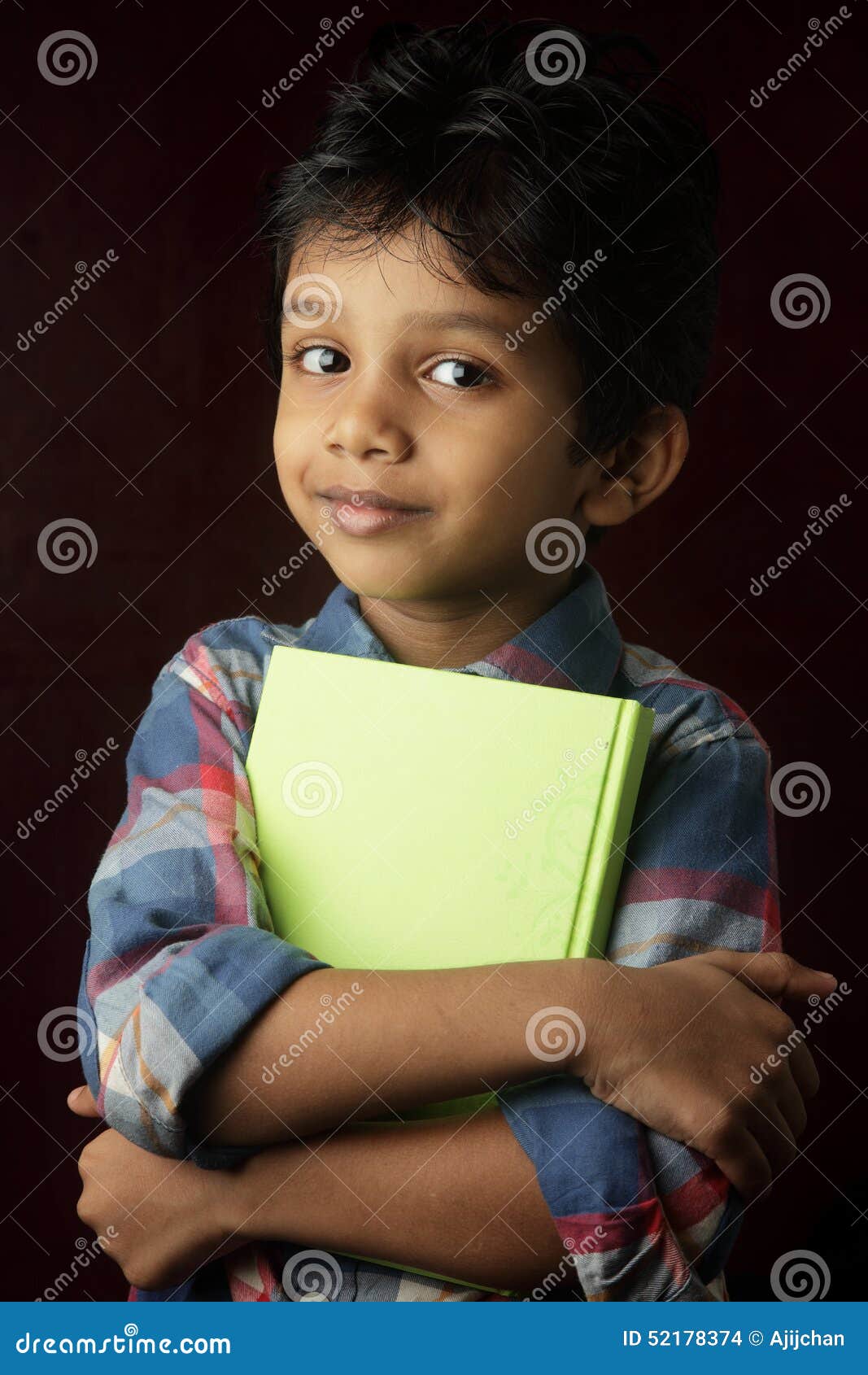 Boy holding a book stock photo. Image of dressing, closeup - 52178374