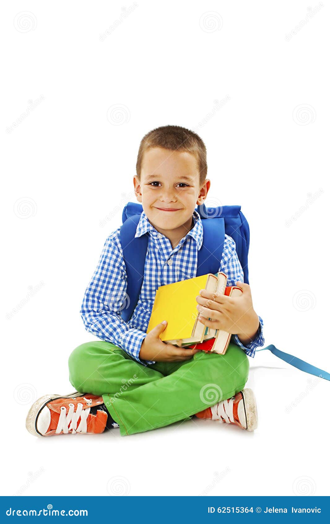 Boy holding books stock photo. Image of childhood, holding - 62515364