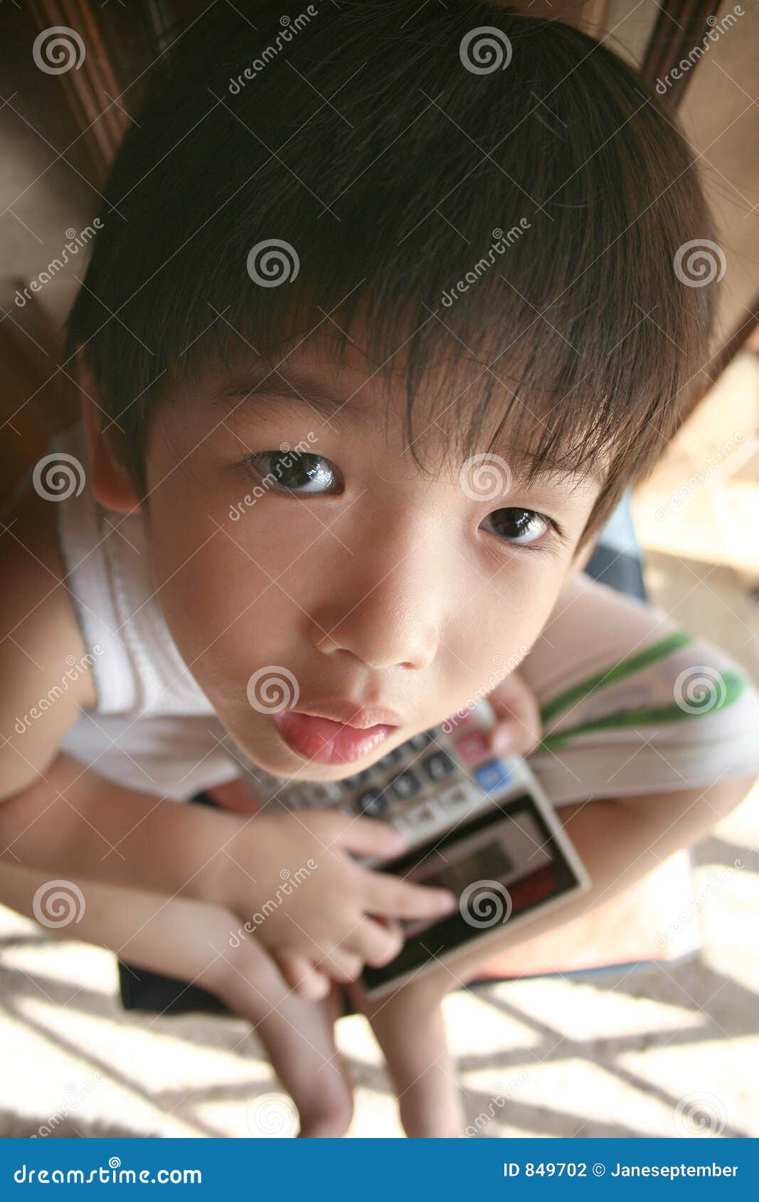 Boy Holding Calculator Looking Up Stock Photo - Image of japanese ...