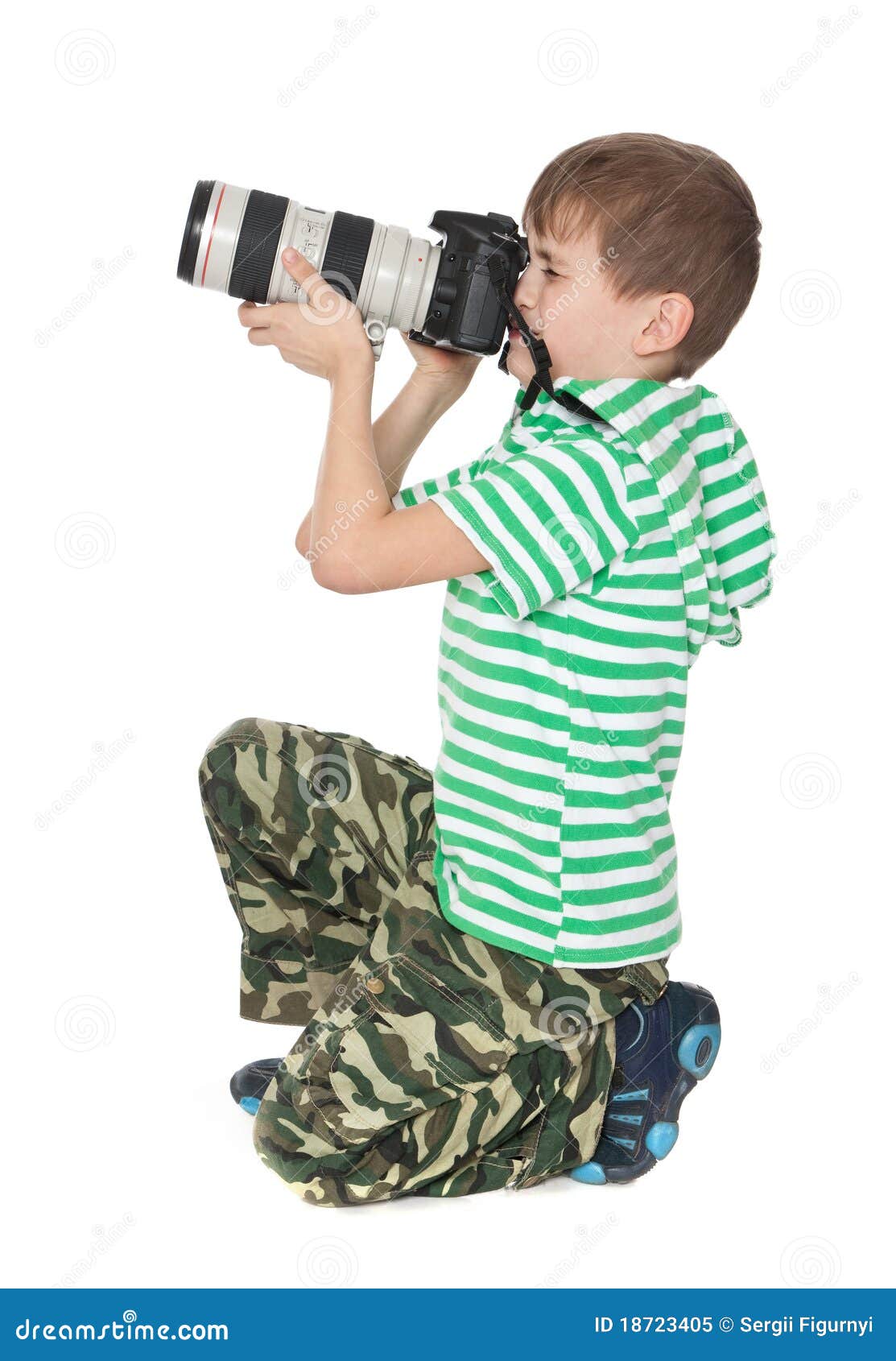 Boy holding a camera stock image. Image of hand, journalist - 18723405
