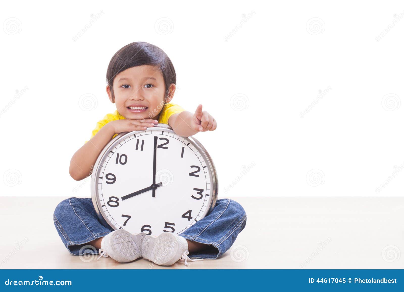 Boy is holding clock stock image. Image of child, little - 44617045
