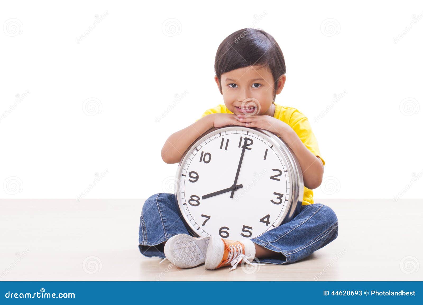 Boy holding clock stock image. Image of early, childhood - 44620693