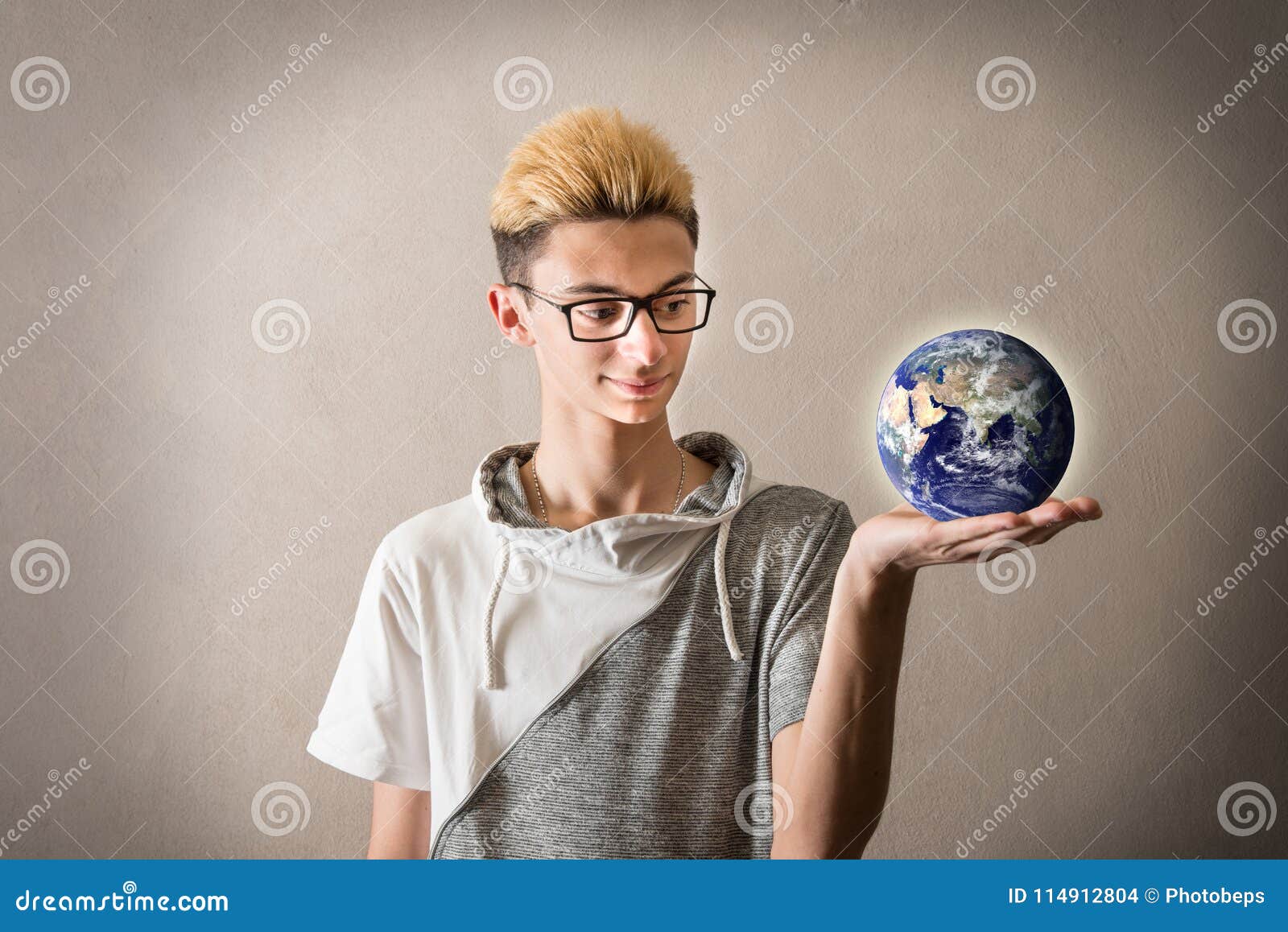Young Man Holding the Earth on the Hand Stock Photo - Image of small ...