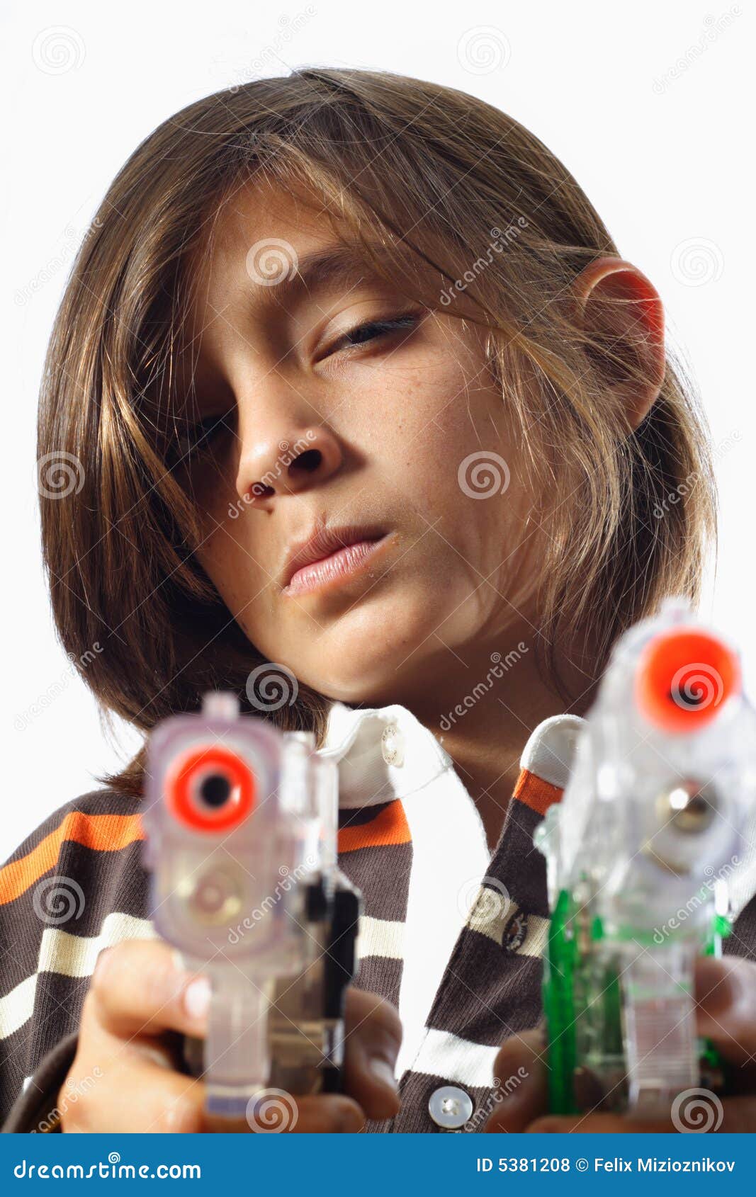 Boy Holding Guns stock photo. Image of copyspace, serious - 5381208