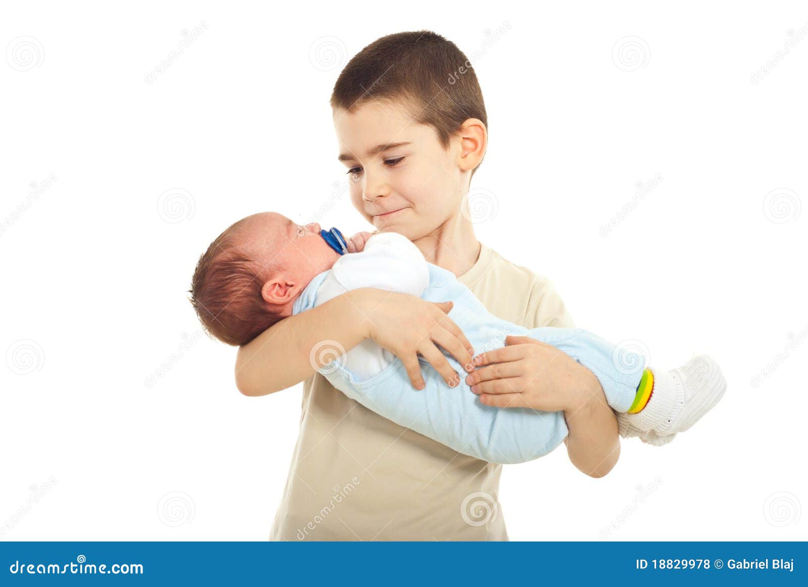 Boy Holding His Newborn Brother Stock Photo - Image of children ...