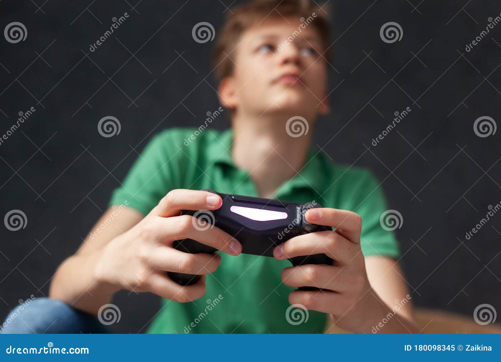Boy Holding Joystick and Playing Video Game, Resting at Home Stock ...