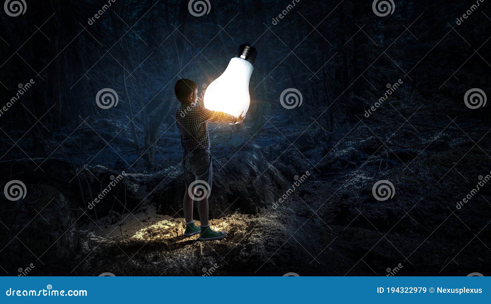 Boy holding a light bulb stock image. Image of child - 194322979