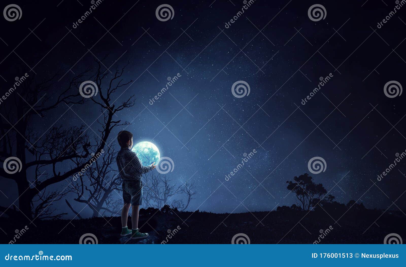Boy holding moon at night stock image. Image of looking - 176001513
